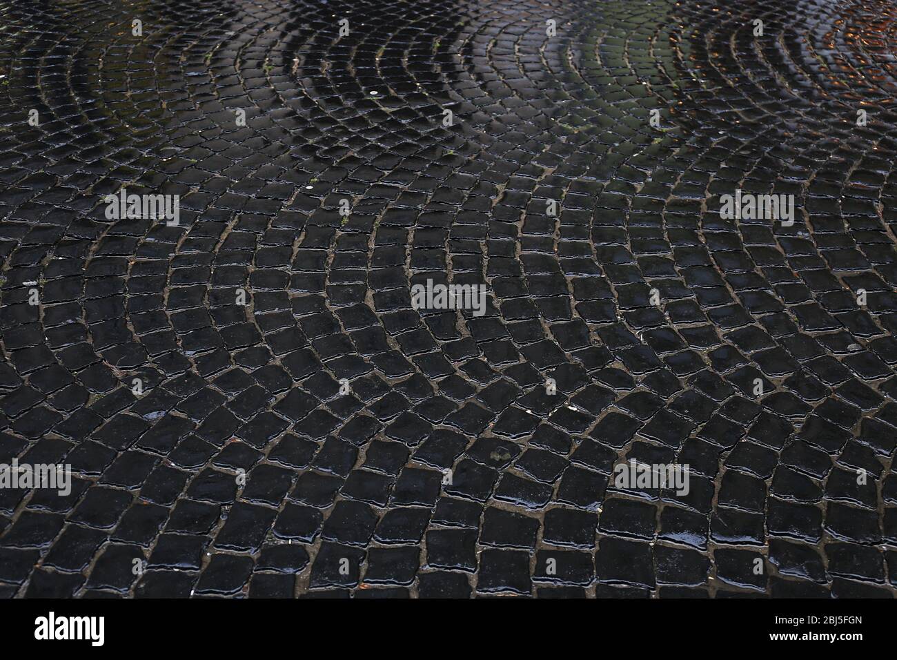 Wet stone pavement Stock Photo - Alamy