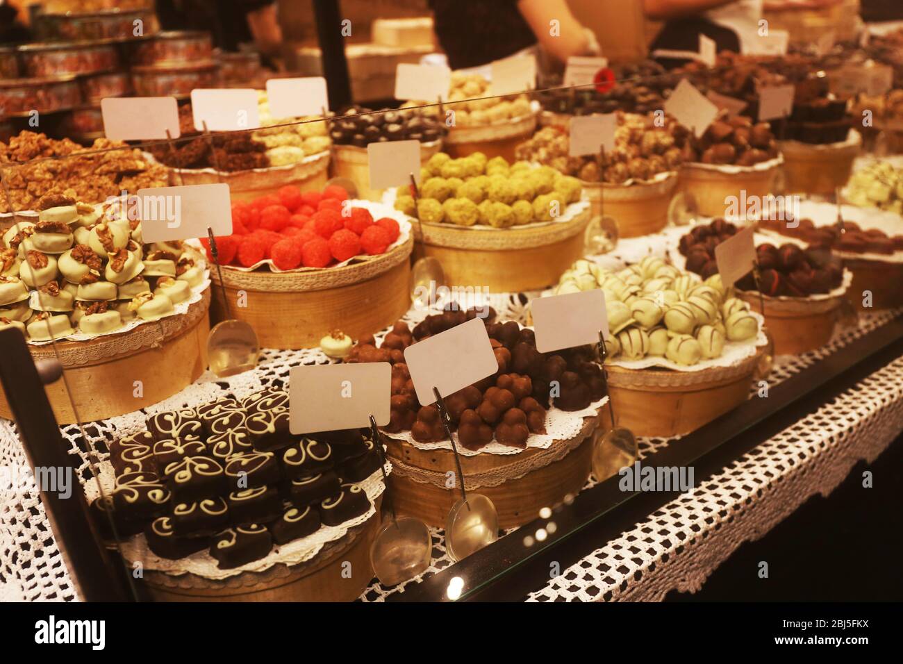 Different chocolate sweets in the shop Stock Photo - Alamy