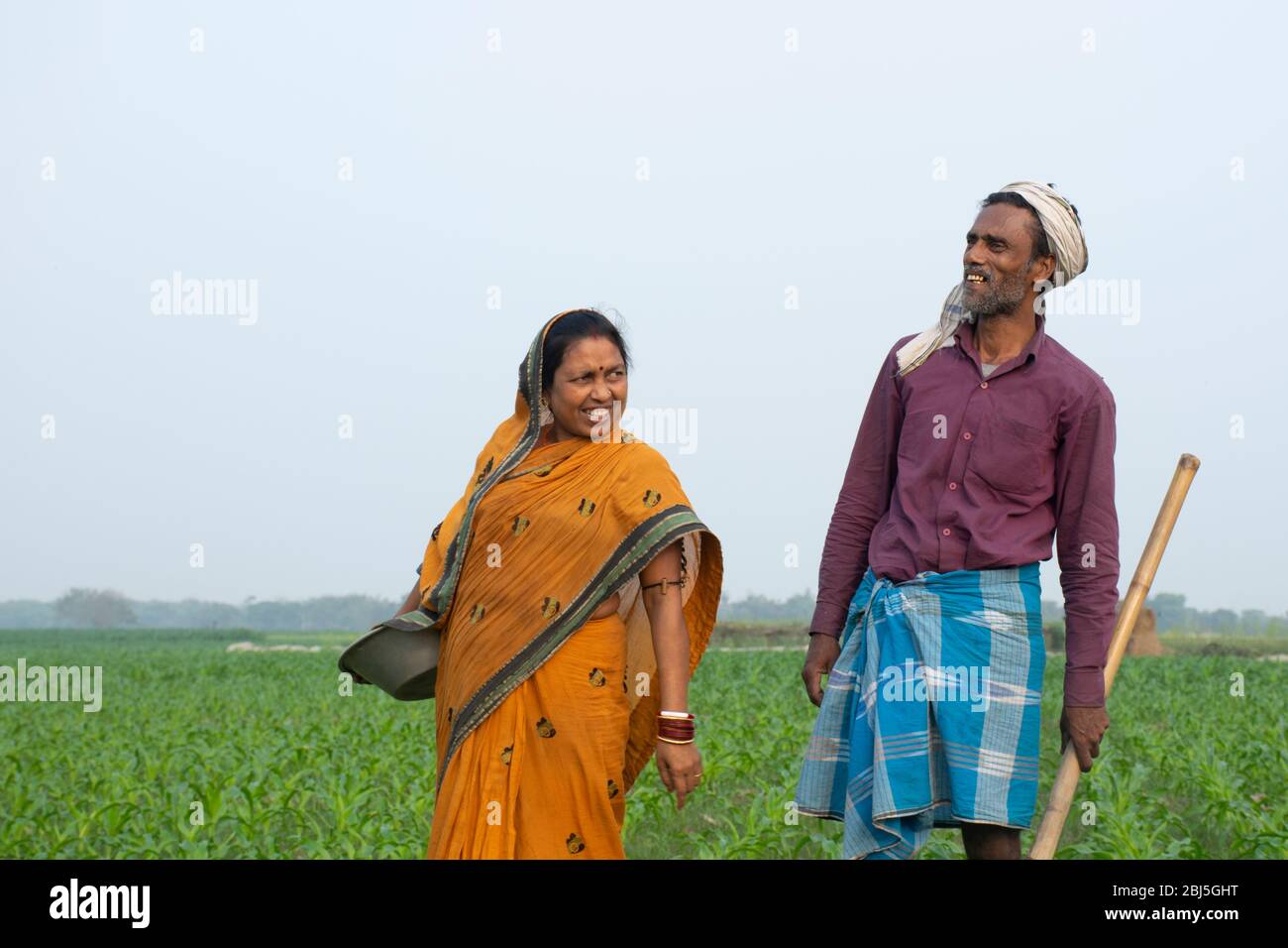 Couple pointing in field hi-res stock photography and images - Alamy