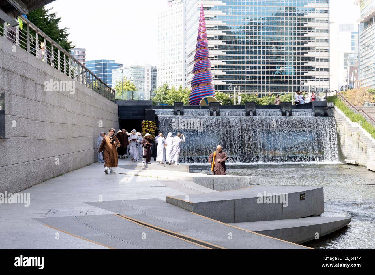 View at famous embankment with buddhist monks Stock Photo - Alamy