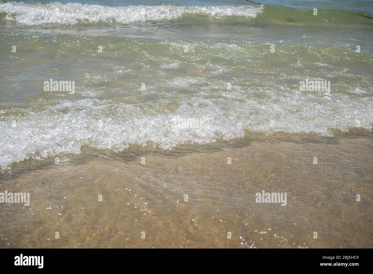 Small waves on the shore. Vacation and tranquility concept. wave water ...