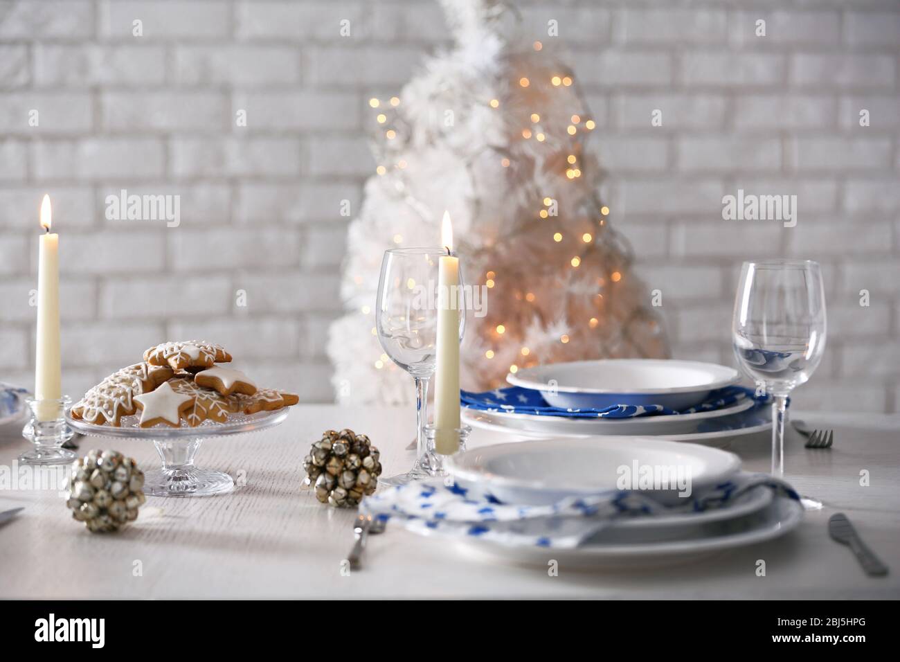 Beautiful Christmas table setting Stock Photo - Alamy