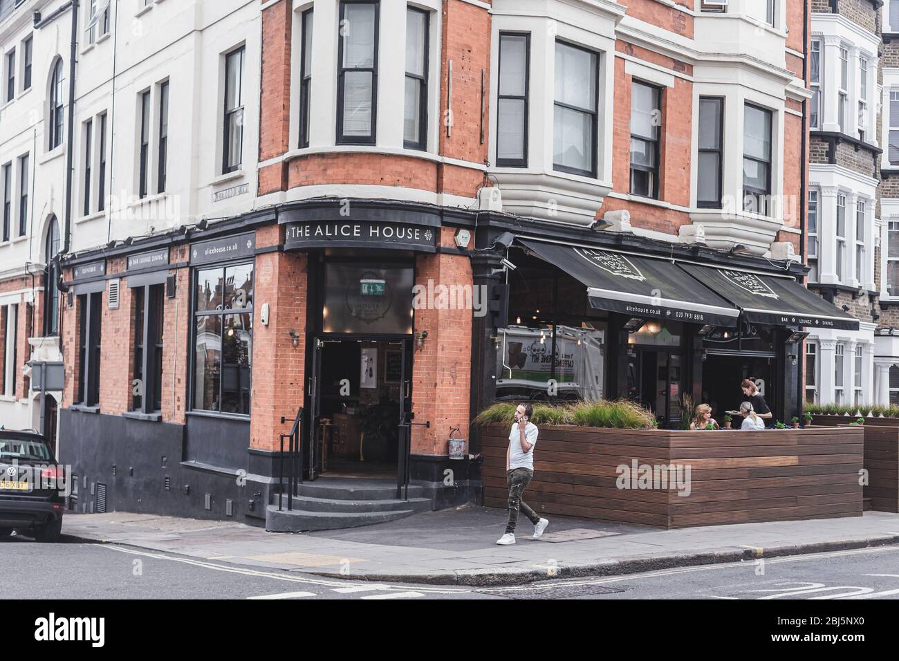 London/UK - 30/07/18: people sitting on a terrace of the Alice House ...