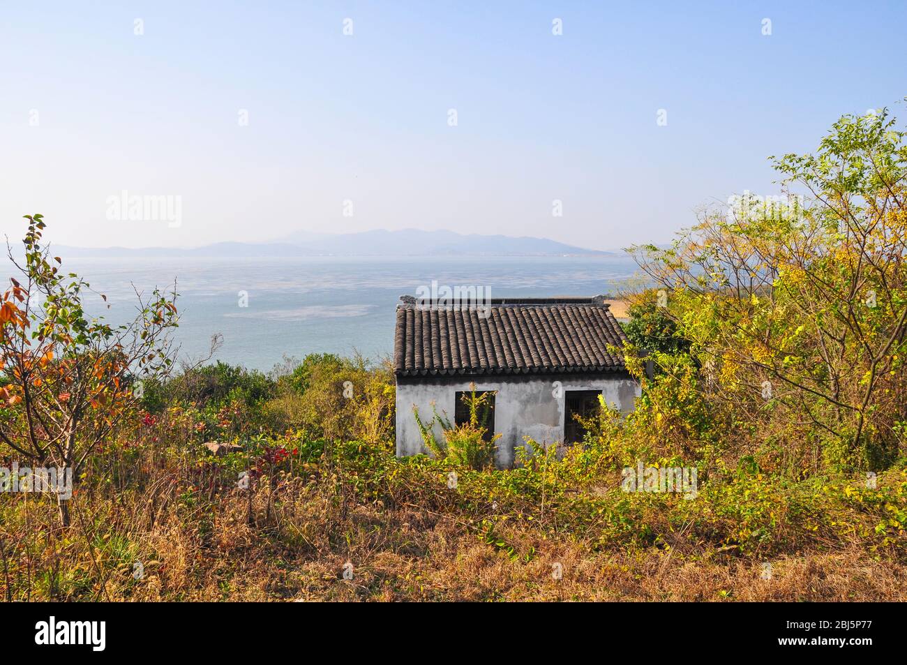 An old little hut on a mountain in the village of Luxiang in China ...