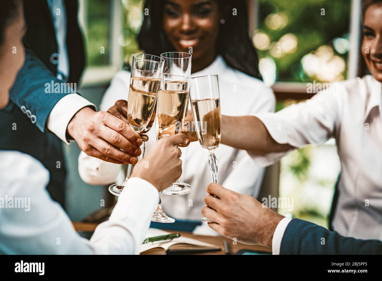 Celebratory Toast At Business Event Of Diverse Team Stock Photo - Alamy