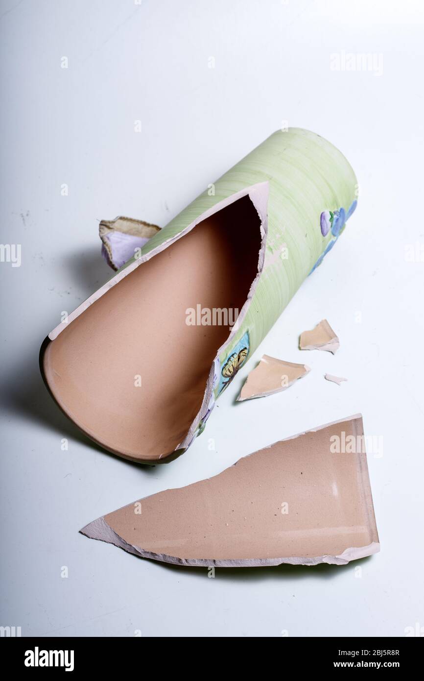 Broken Porcelain Vase Lying on White Background Stock Photo - Alamy
