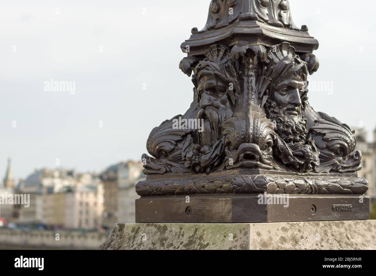 The base of the street lamp in Paris, France Stock Photo - Alamy