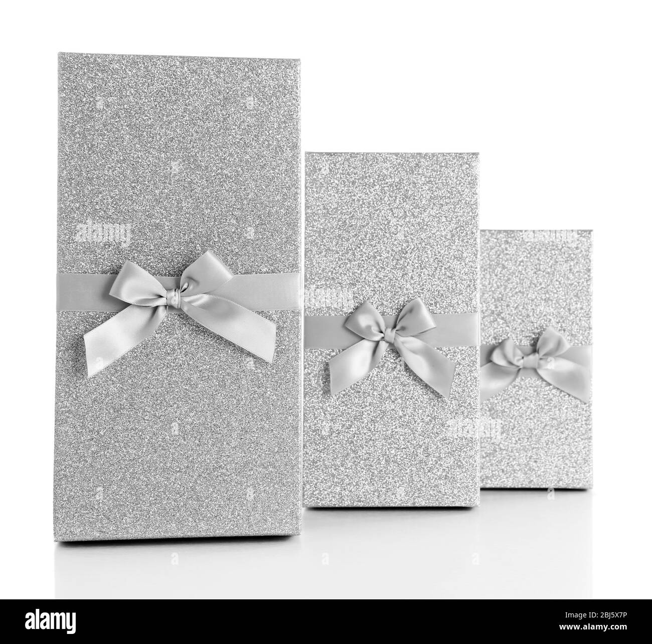 Silver wrapped box isolated Black and White Stock Photos & Images - Alamy