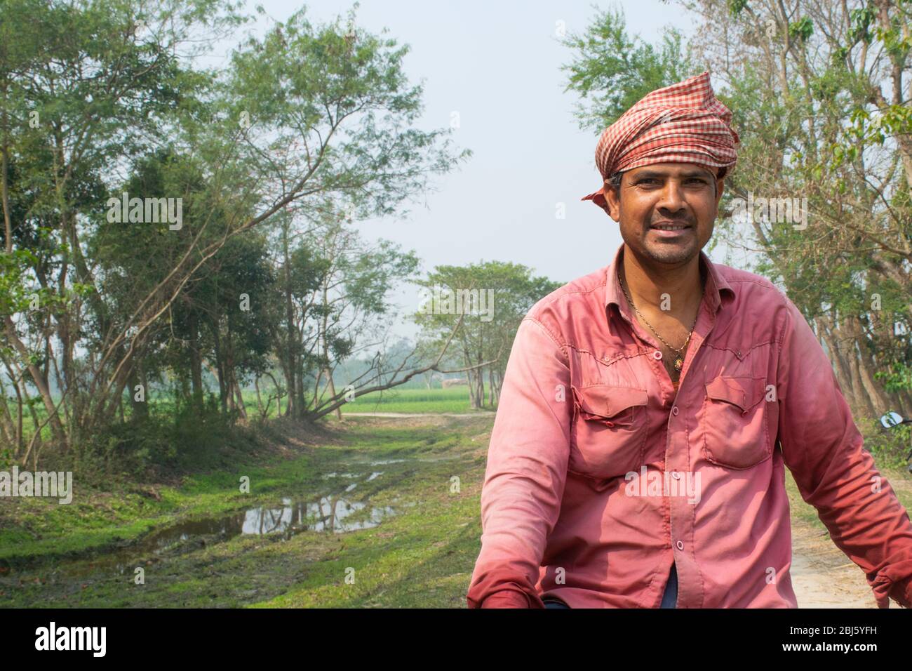 farmer with his cycle in rural village, India Stock Photo - Alamy