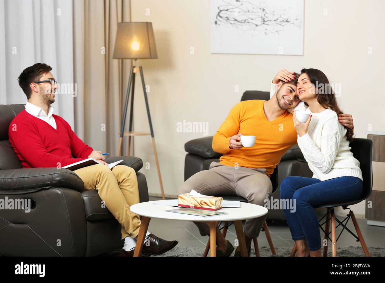 Young happy couple after therapy session with family psychologist Stock ...