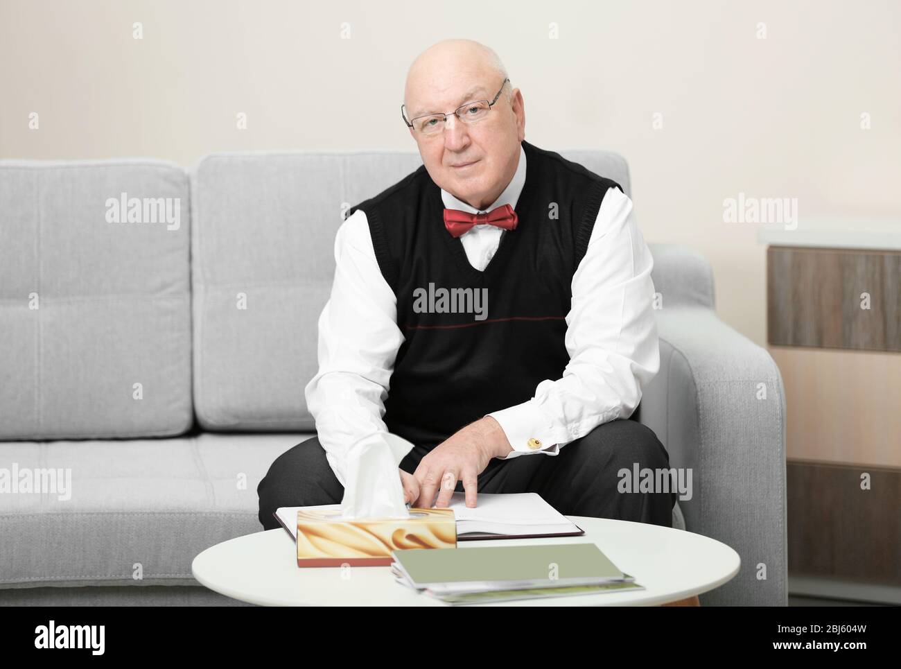 Aged psychologist at work Stock Photo - Alamy
