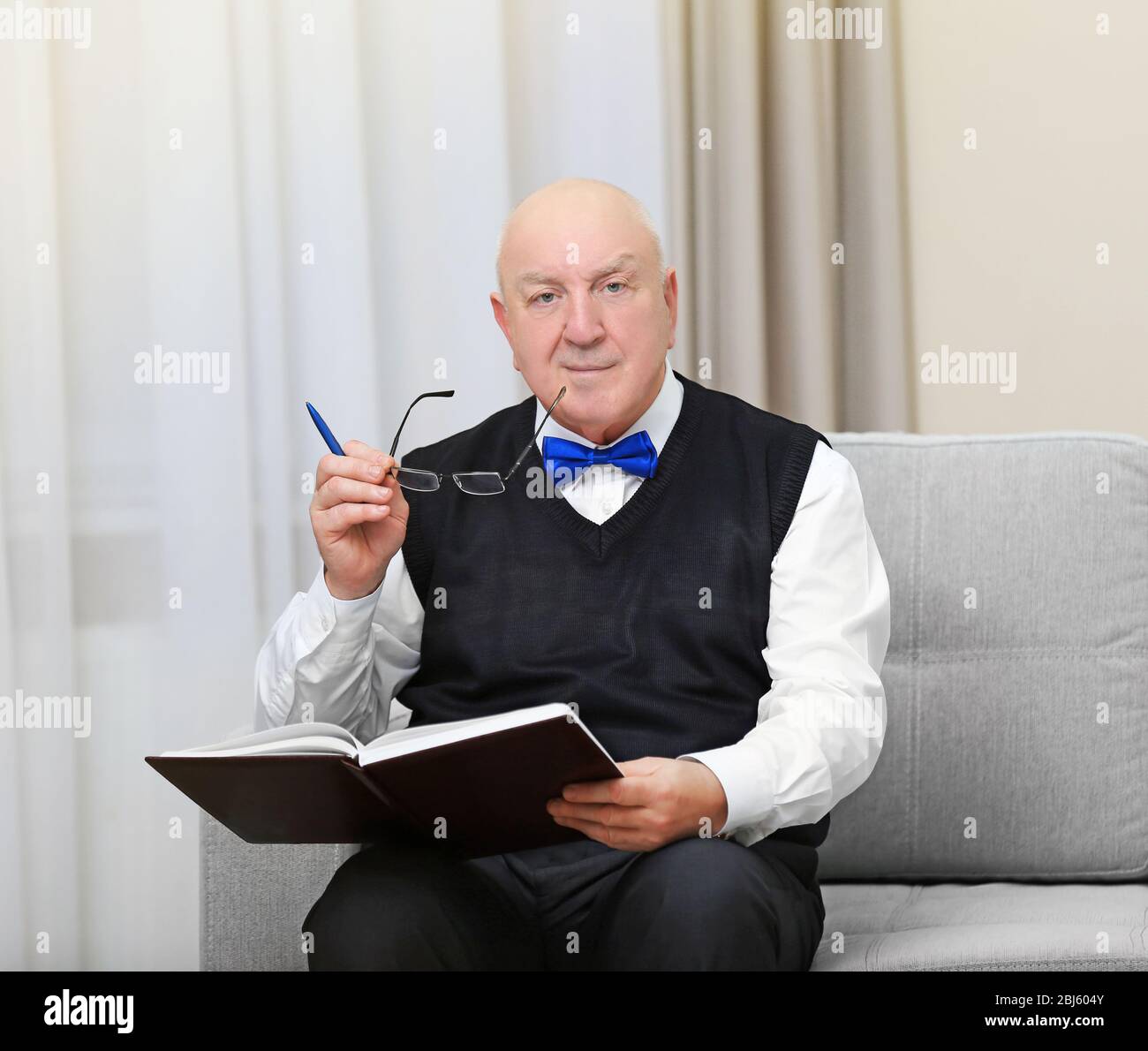 Aged psychologist at work Stock Photo - Alamy