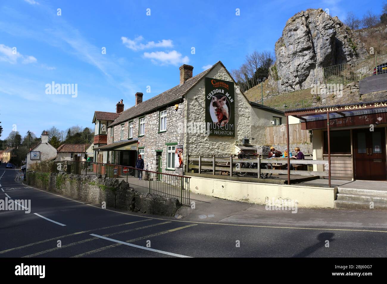 Cheddar Gorge is a limestone gorge in the Mendip Hills , near the ...