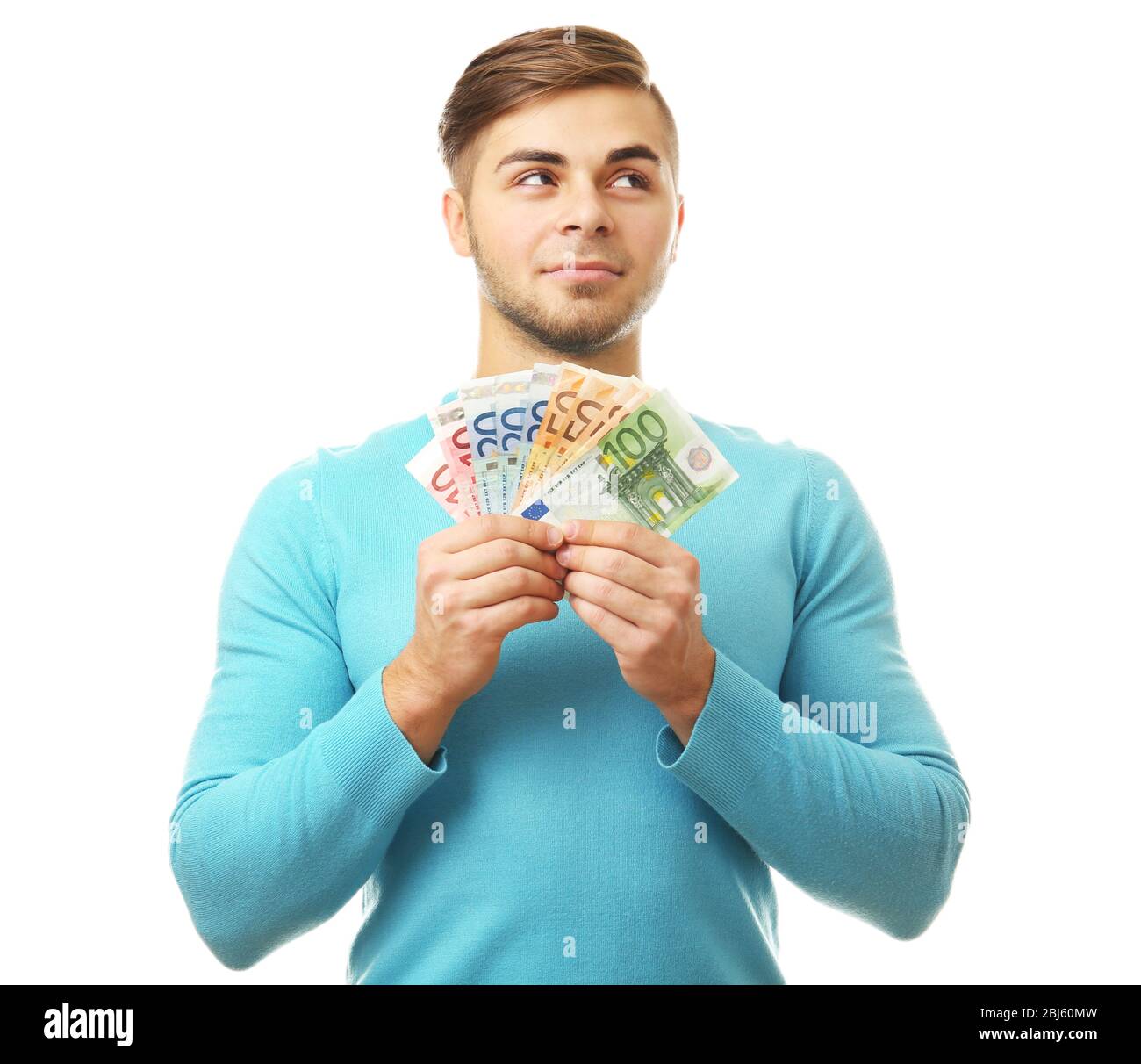 Man holding money isolated on white Stock Photo - Alamy
