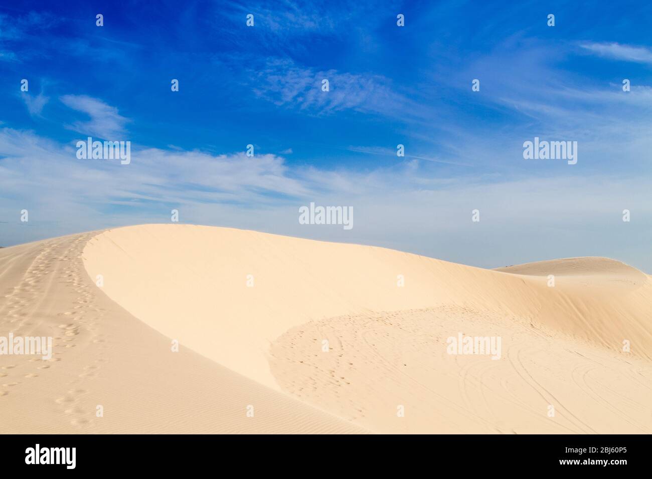 Desert crest in the desert against blue sky Stock Photo - Alamy