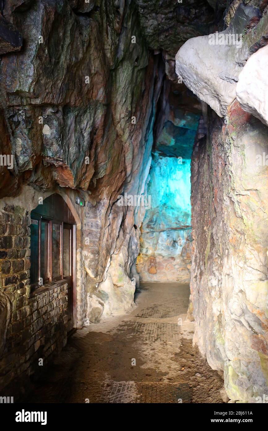 Cheddar Gorge is a limestone gorge in the Mendip Hills , near the ...