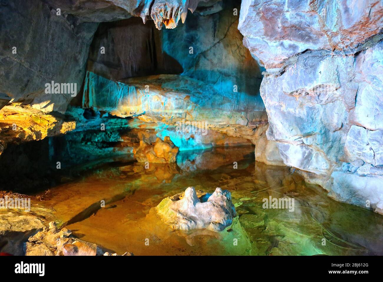 Cheddar Gorge is a limestone gorge in the Mendip Hills , near the ...