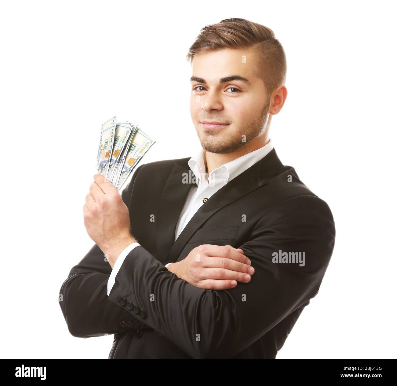 Man holding money isolated on white Stock Photo - Alamy