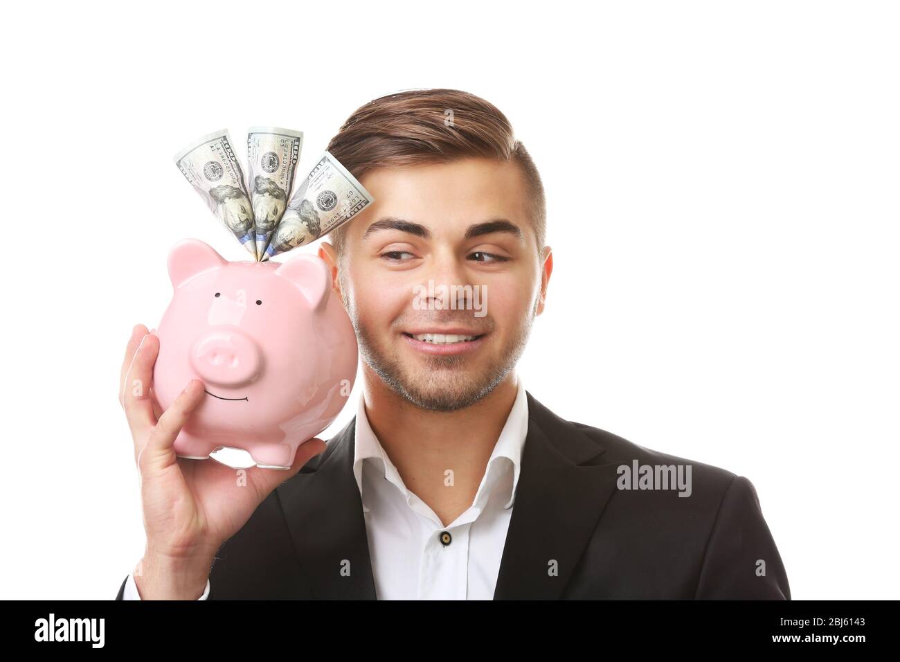Man holding money isolated on white Stock Photo - Alamy
