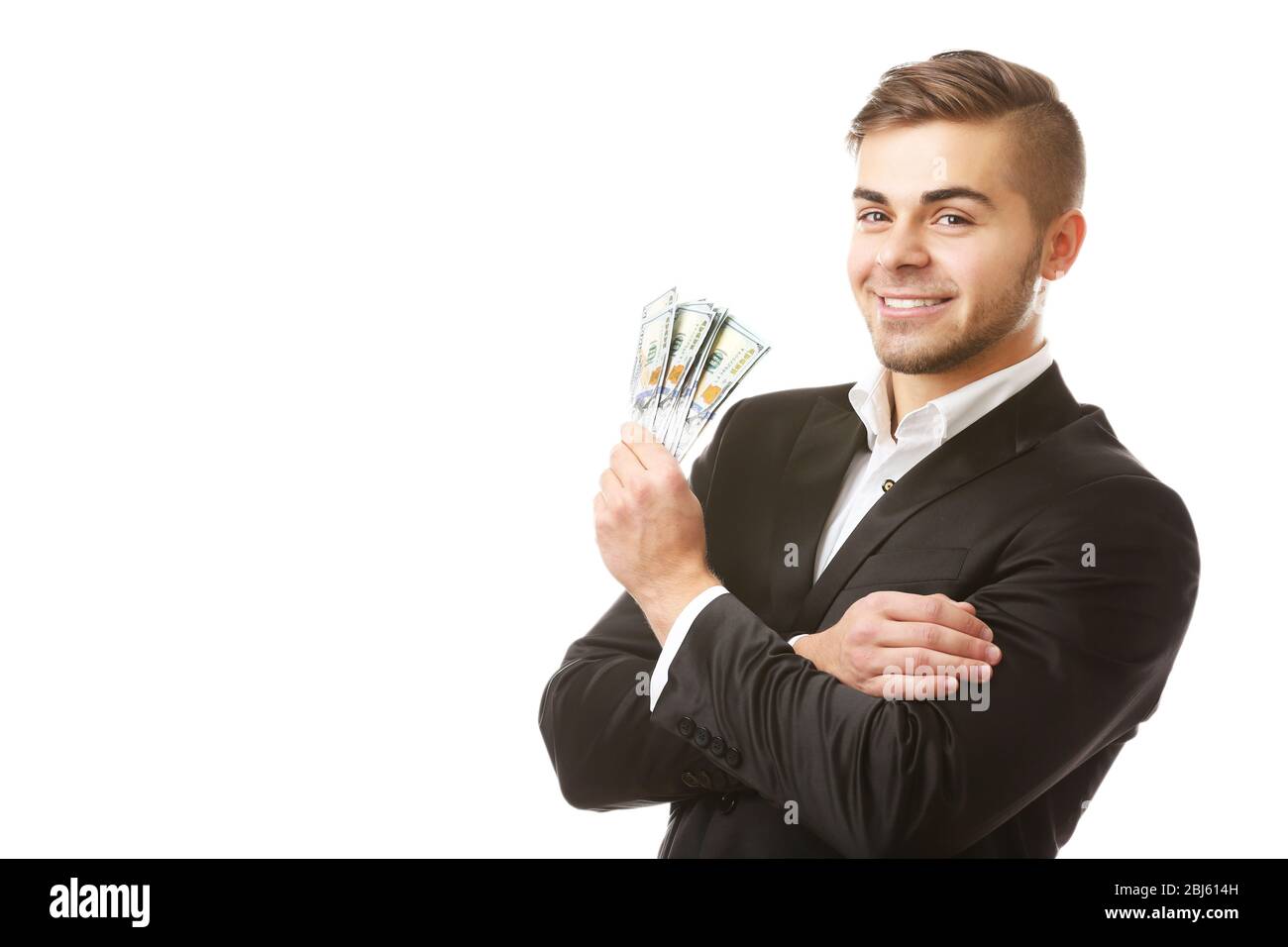 Man holding money isolated on white Stock Photo - Alamy