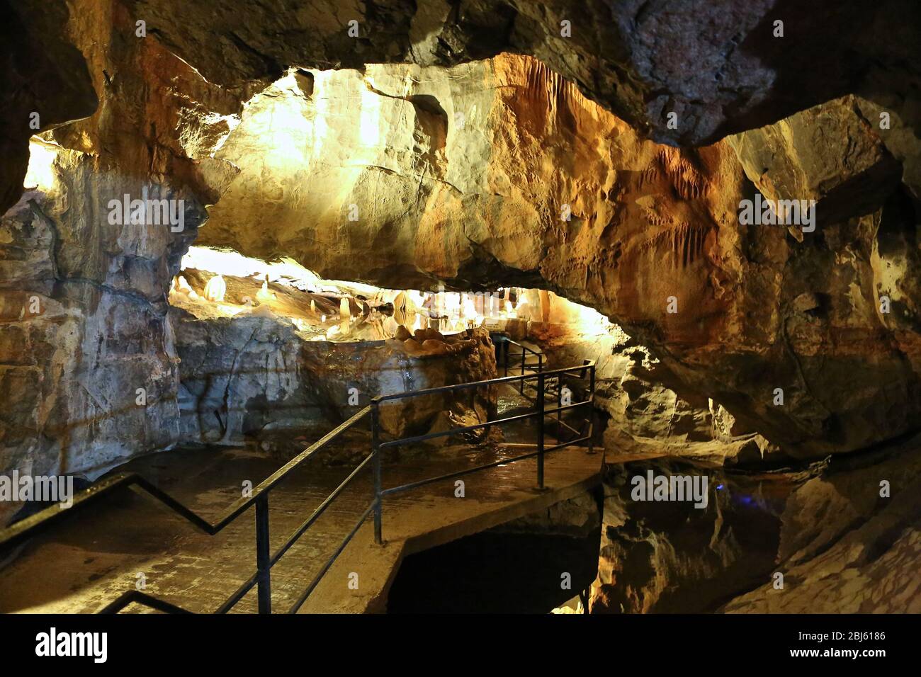 Cheddar Gorge is a limestone gorge in the Mendip Hills , near the ...
