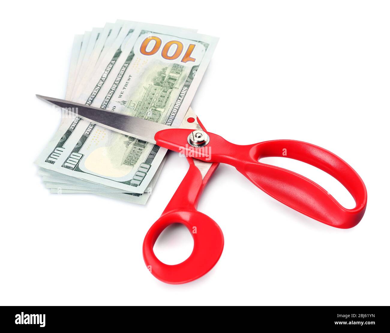 Scissors cut dollar banknotes, isolated on white Stock Photo - Alamy
