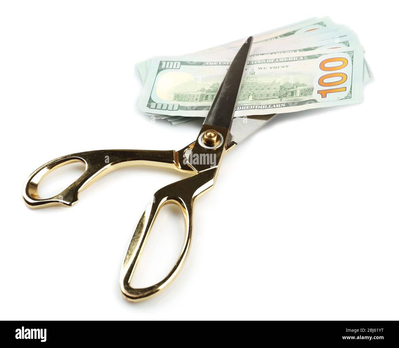 Scissors cut dollar banknotes, isolated on white Stock Photo - Alamy