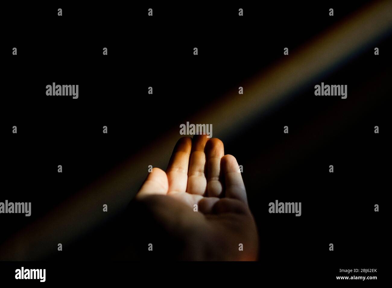 Hand reaching out shadow hi-res stock photography and images - Alamy