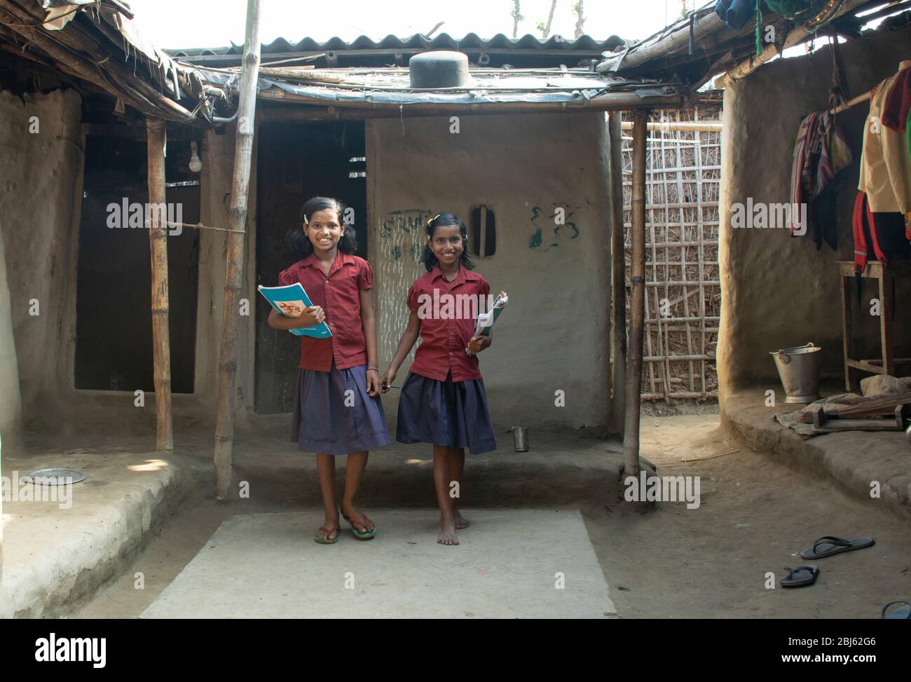 rural girls with book at her house, ready for school Stock Photo - Alamy