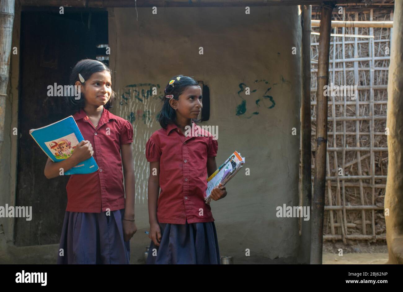 rural girls with book at her house, ready for school Stock Photo - Alamy