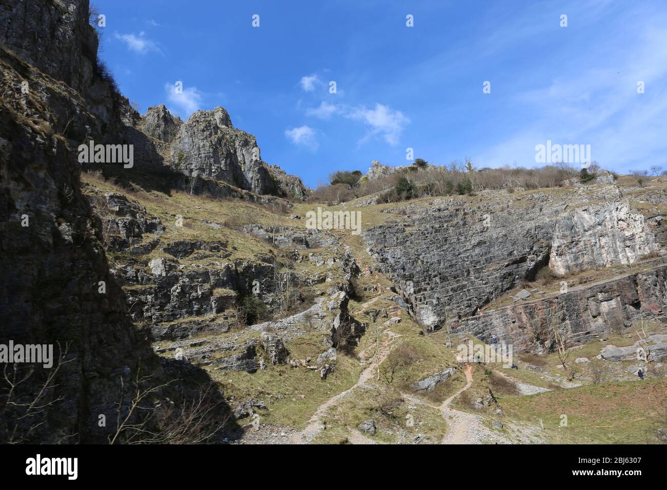 Cheddar Gorge is a limestone gorge in the Mendip Hills , near the ...