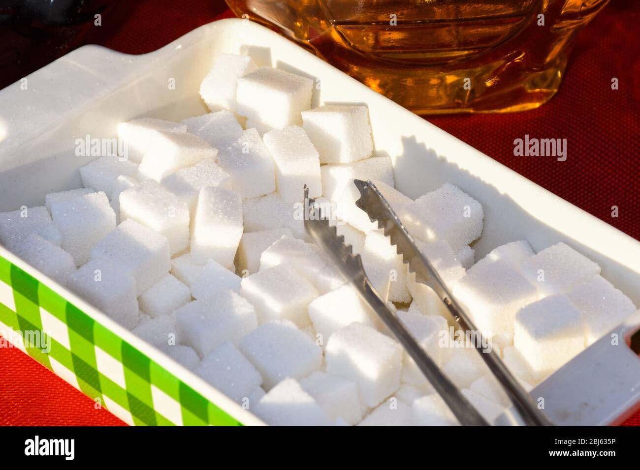Sugar cubes or fructose cubes displayed in a box Stock Photo - Alamy