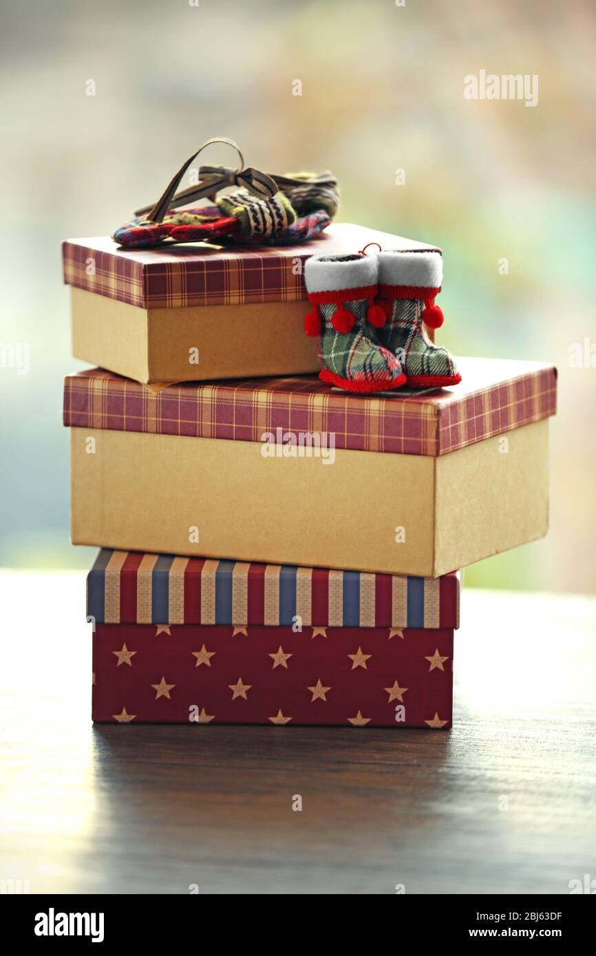 Christmas gifts on a table Stock Photo - Alamy