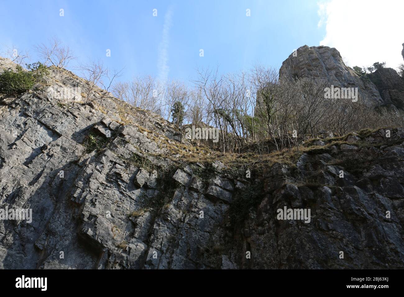 Cheddar Gorge is a limestone gorge in the Mendip Hills , near the ...