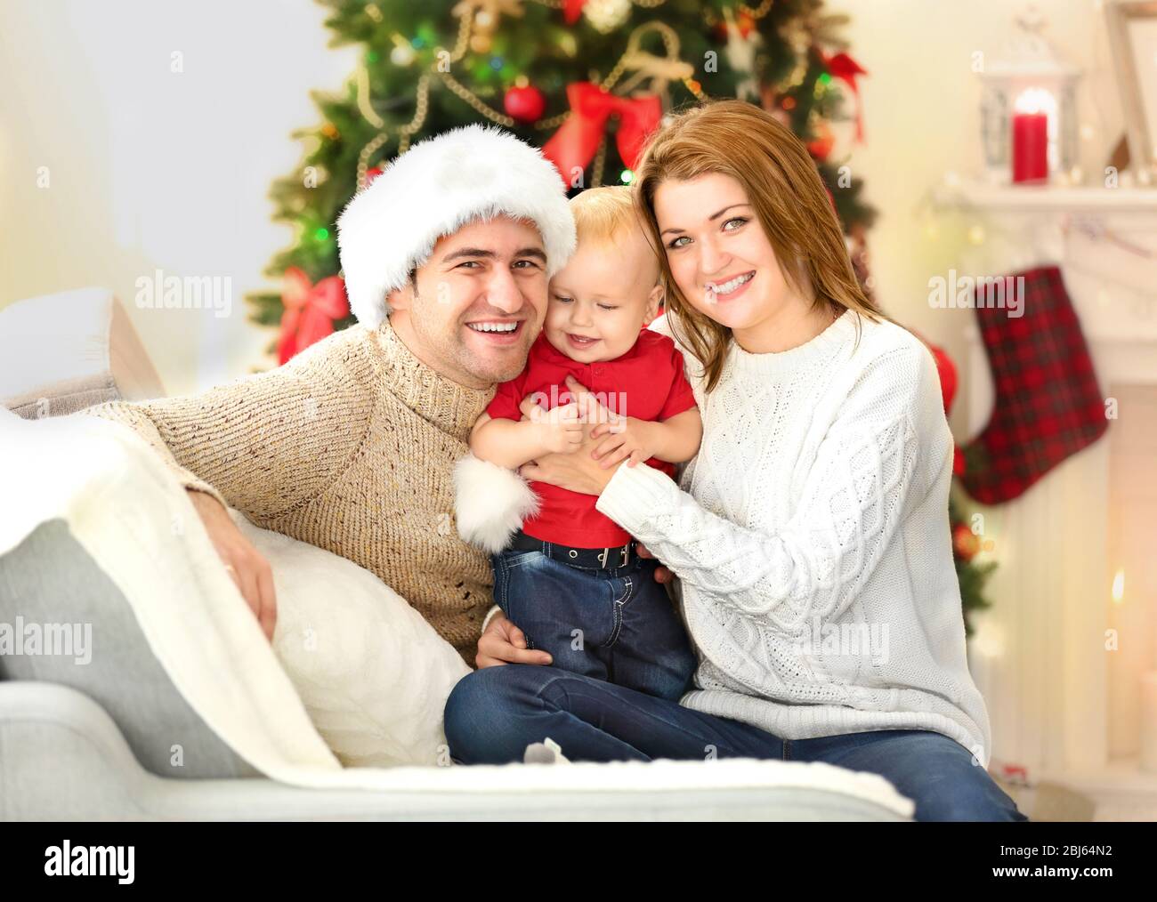 Christmas family portrait in home holiday living room Stock Photo - Alamy