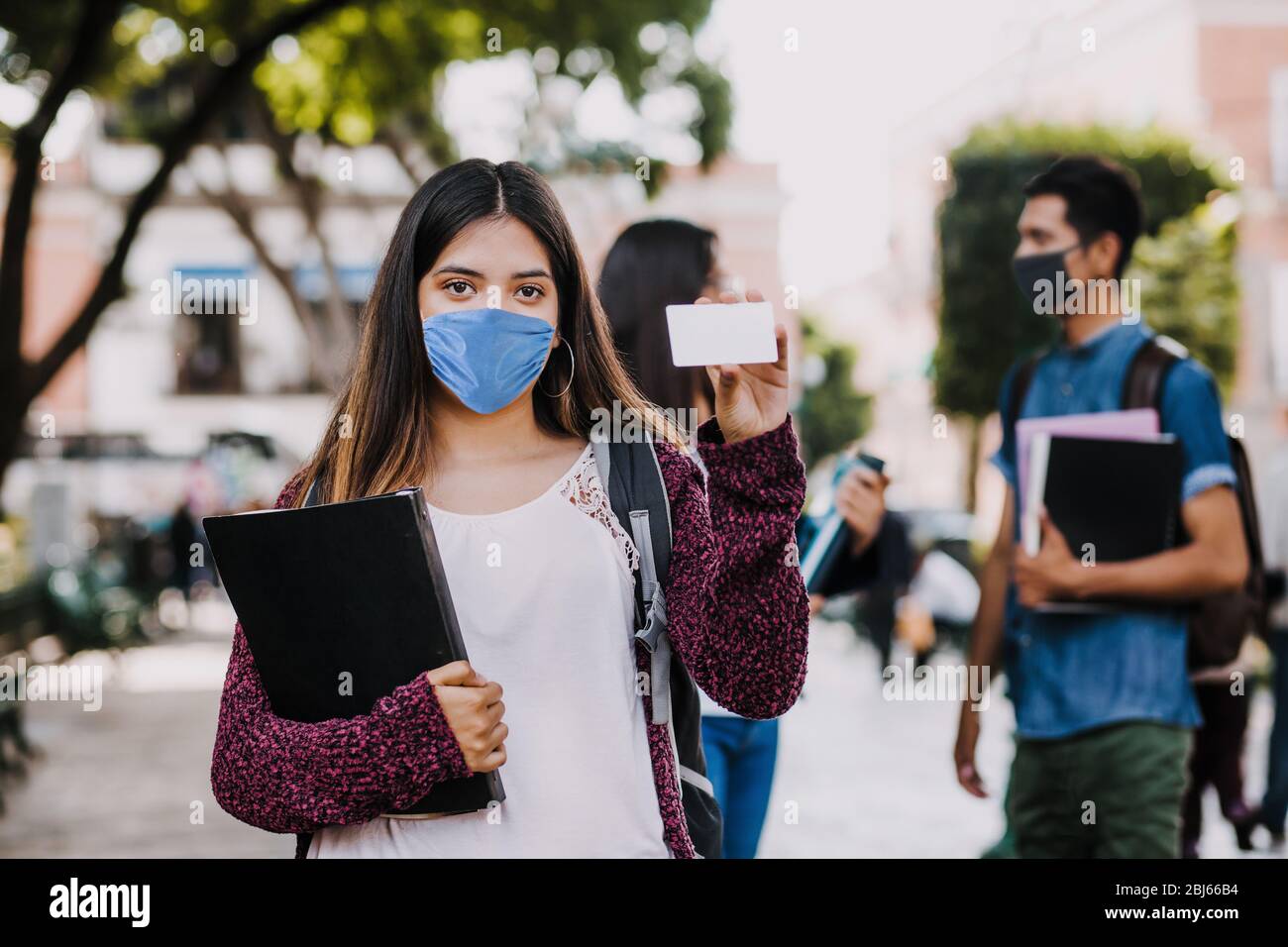 mexican girl student wearing mask face to prevent infection or ...