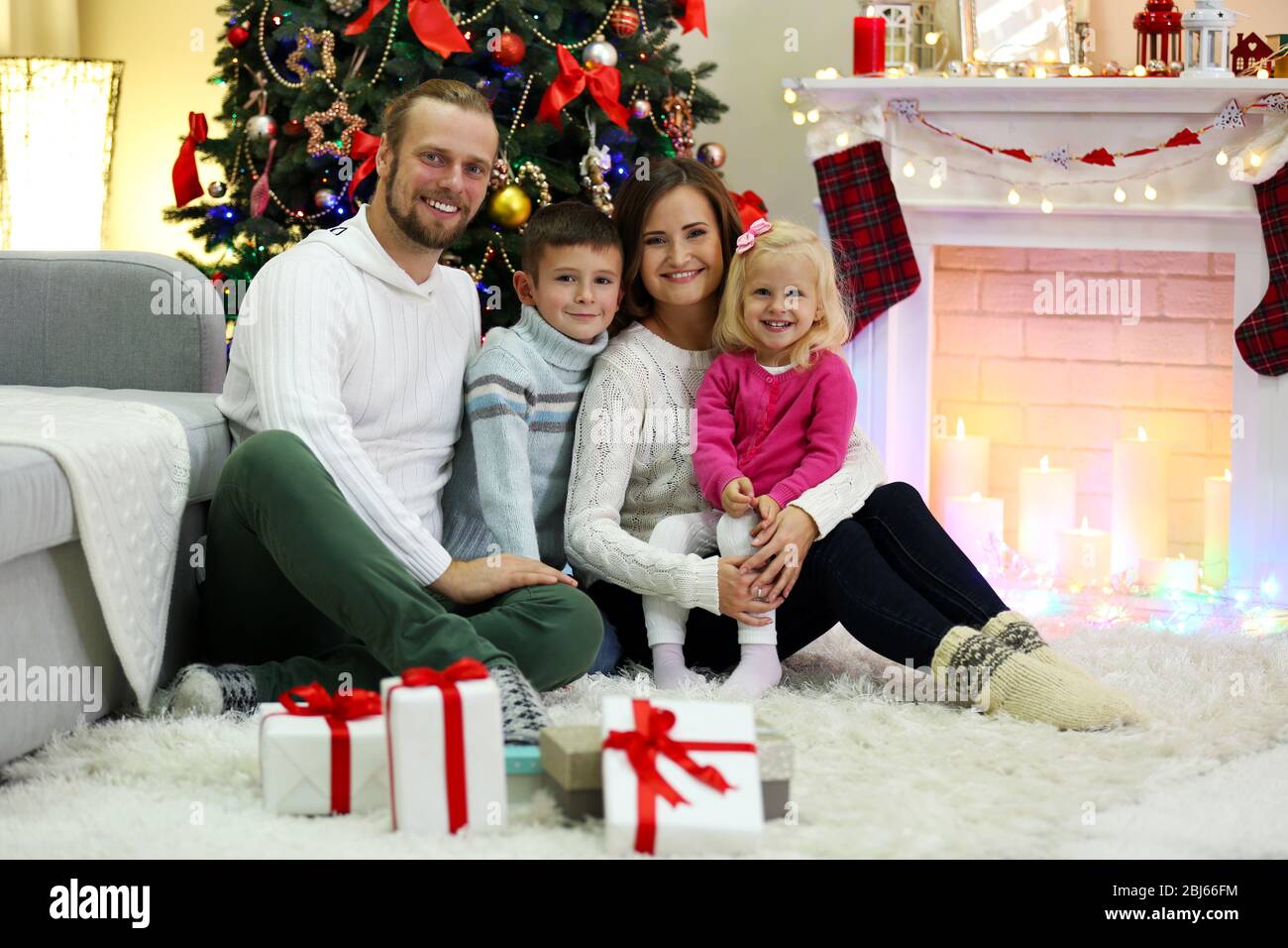 Christmas family portrait in home holiday living room Stock Photo - Alamy