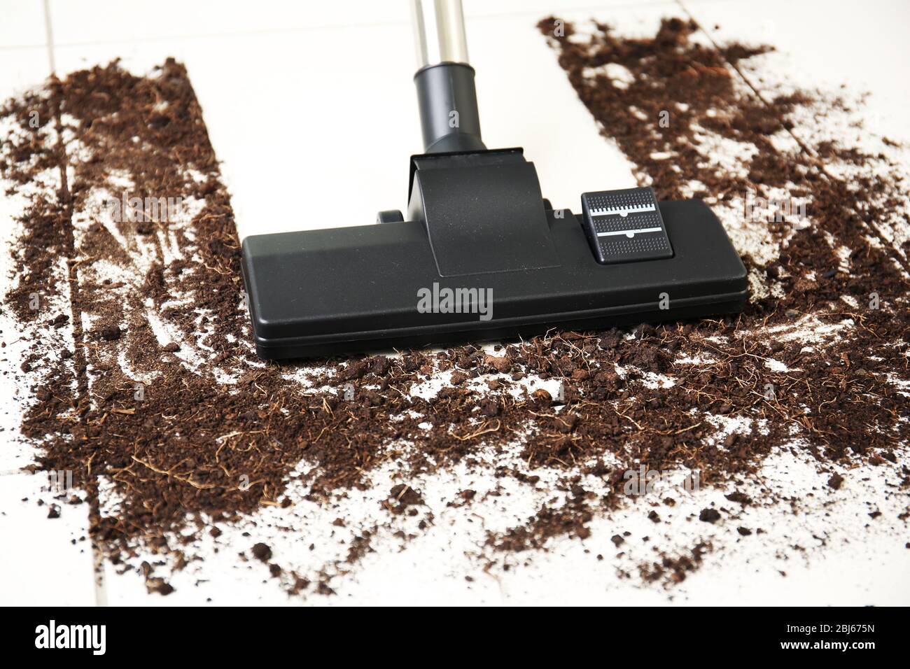 Cleaning concept - carpet sweeper and dust, close up Stock Photo - Alamy
