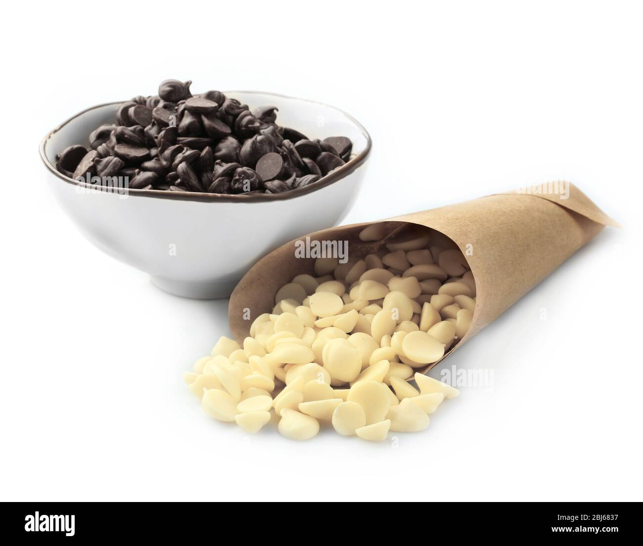 Chocolate morsels, close-up, isolated on white Stock Photo - Alamy