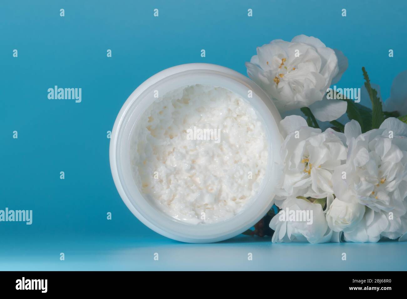 Facial oxygenating detox cream texture. Face cream with herbal cherry ...