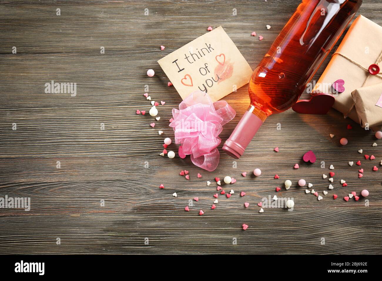 One love, one life concept - wine bottle and glasses with hearts around ...