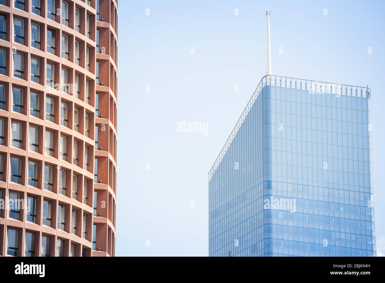 Abstract background perspective of high rise towers, blue and beige ...