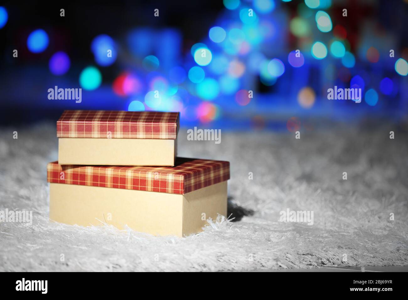 Shining gift boxes pile hi-res stock photography and images - Alamy