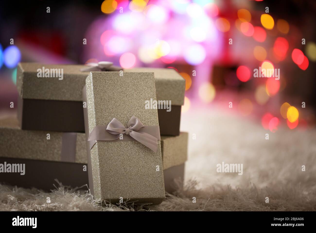 Shining gift boxes pile hi-res stock photography and images - Alamy