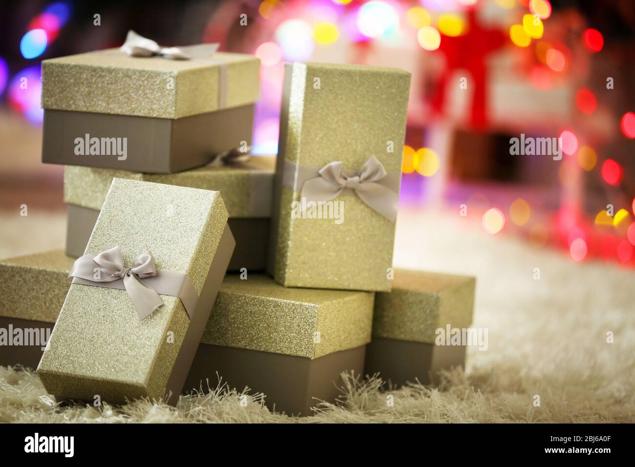 Shining gift boxes pile hi-res stock photography and images - Alamy