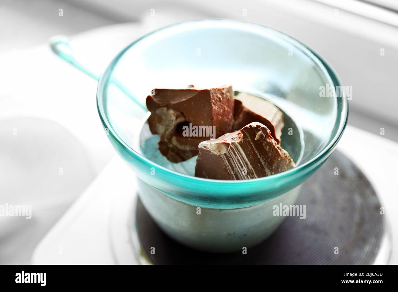 Melting chocolate stove hi-res stock photography and images - Alamy