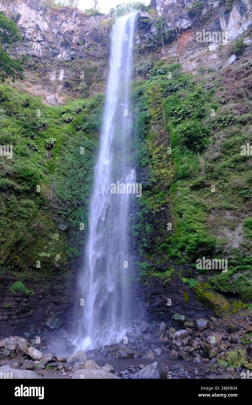 Malang Indonesia - Coban Rondo Waterfall vertical Stock Photo - Alamy
