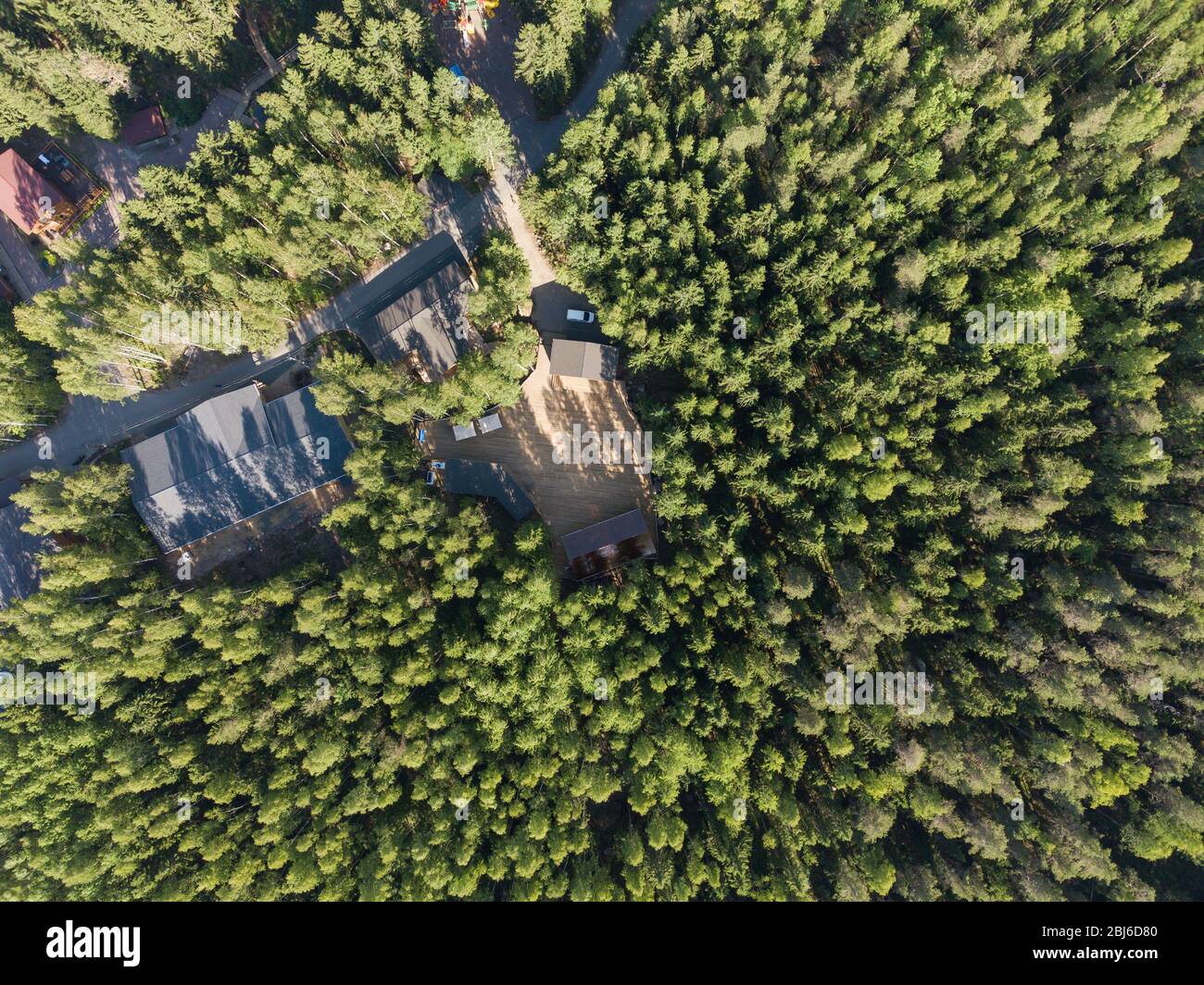 Aerial view of a wooden platform with shadows from trees Stock Photo ...