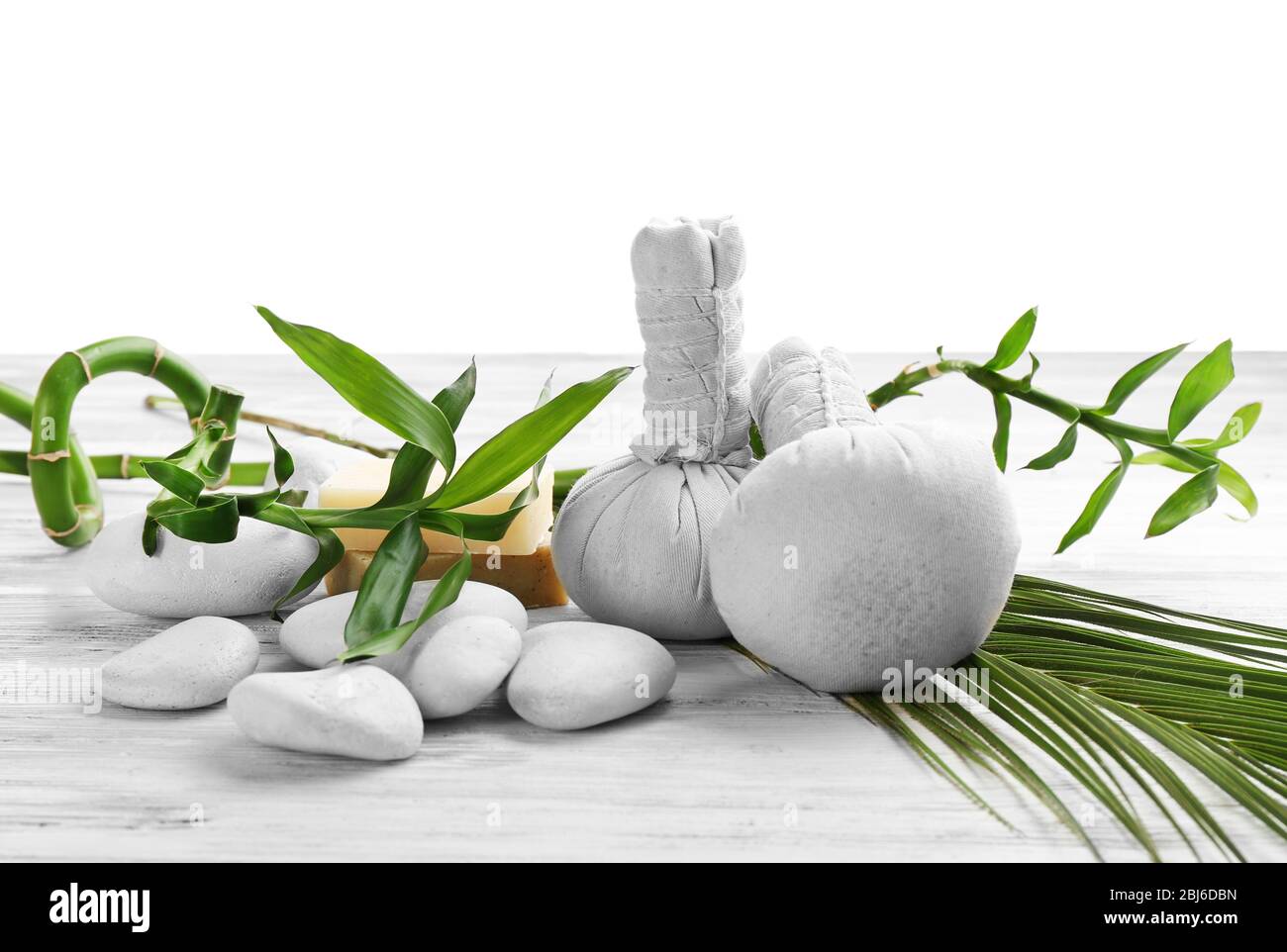 Spa set on wooden table against white background Stock Photo - Alamy
