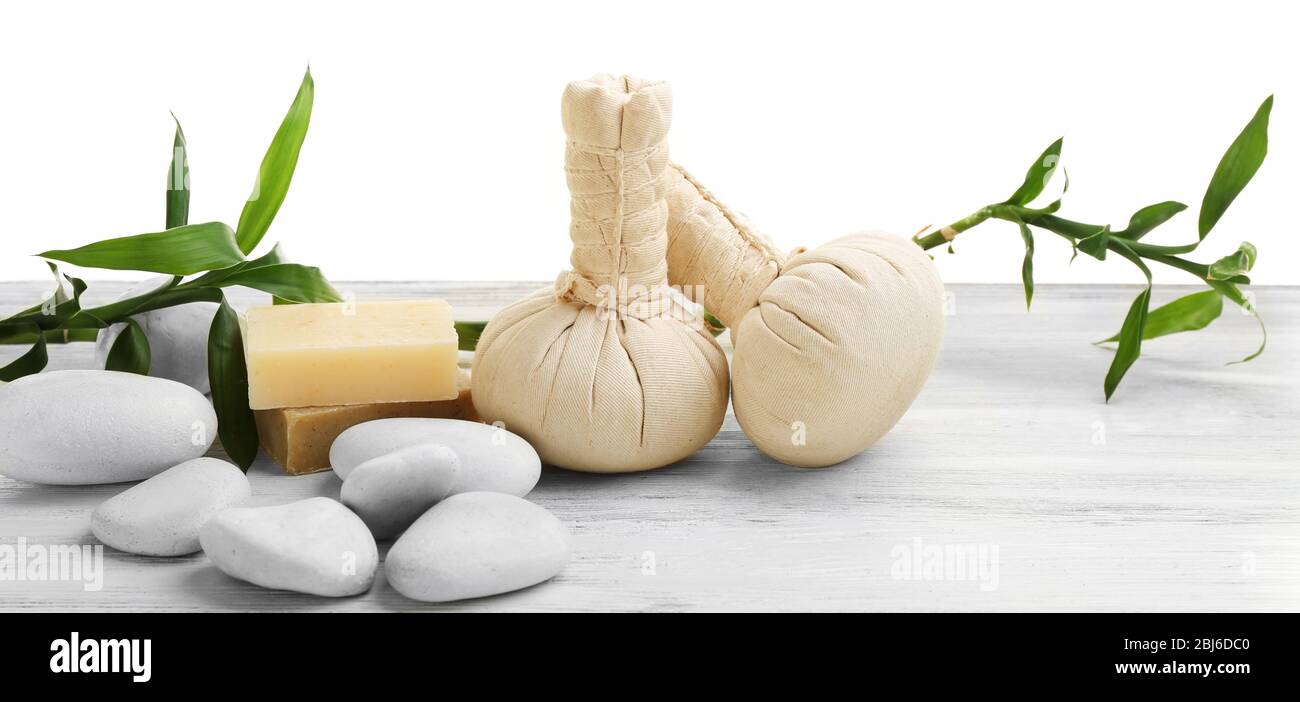 Spa set on wooden table against white background Stock Photo - Alamy